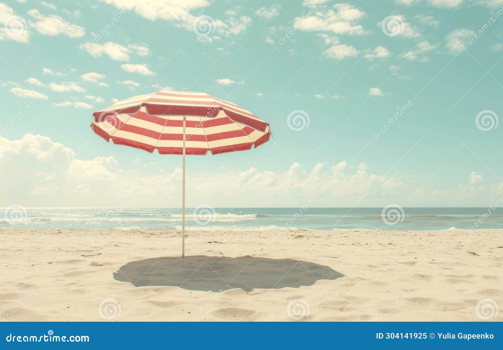 A Beach Scene with a Red and White Striped Umbrella Stock Image - Image ...