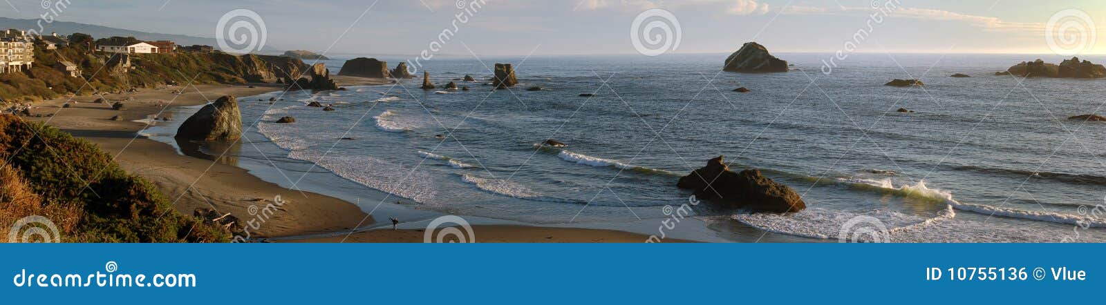 Beach scene with rocks stock photo. Image of houses, panoramic - 10755136