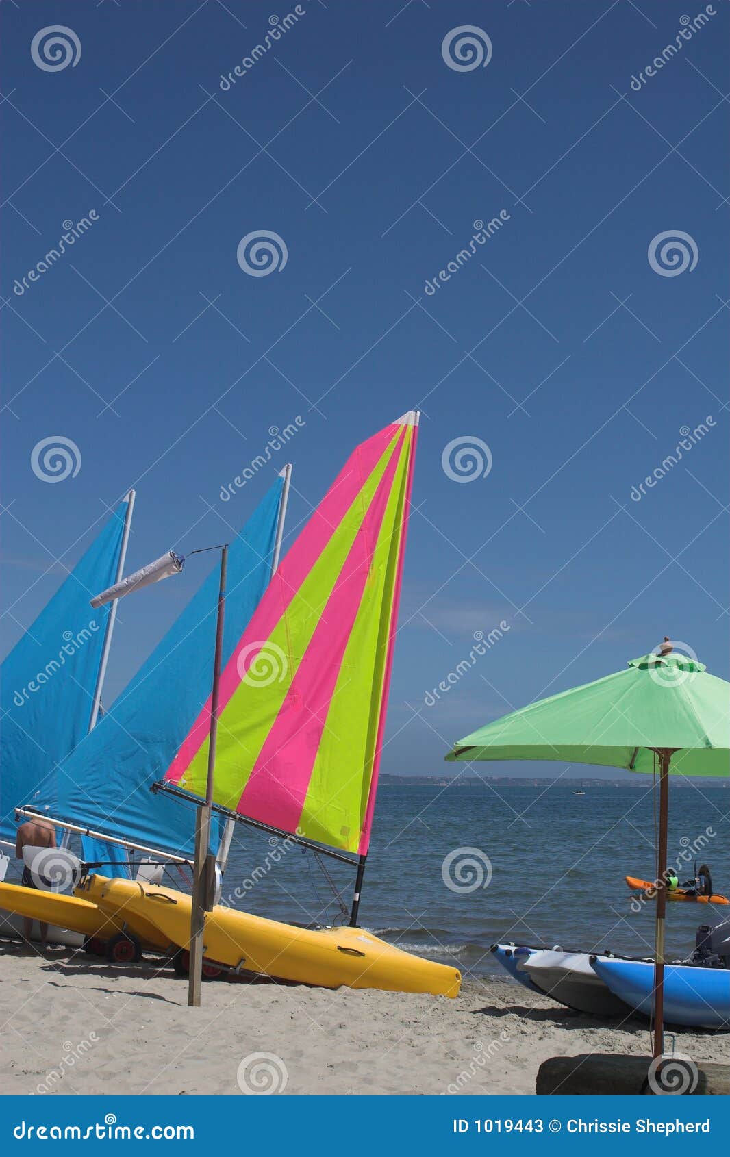 Beach Scene with Yachts and Canoe Stock Image - Image of ocean, beach ...