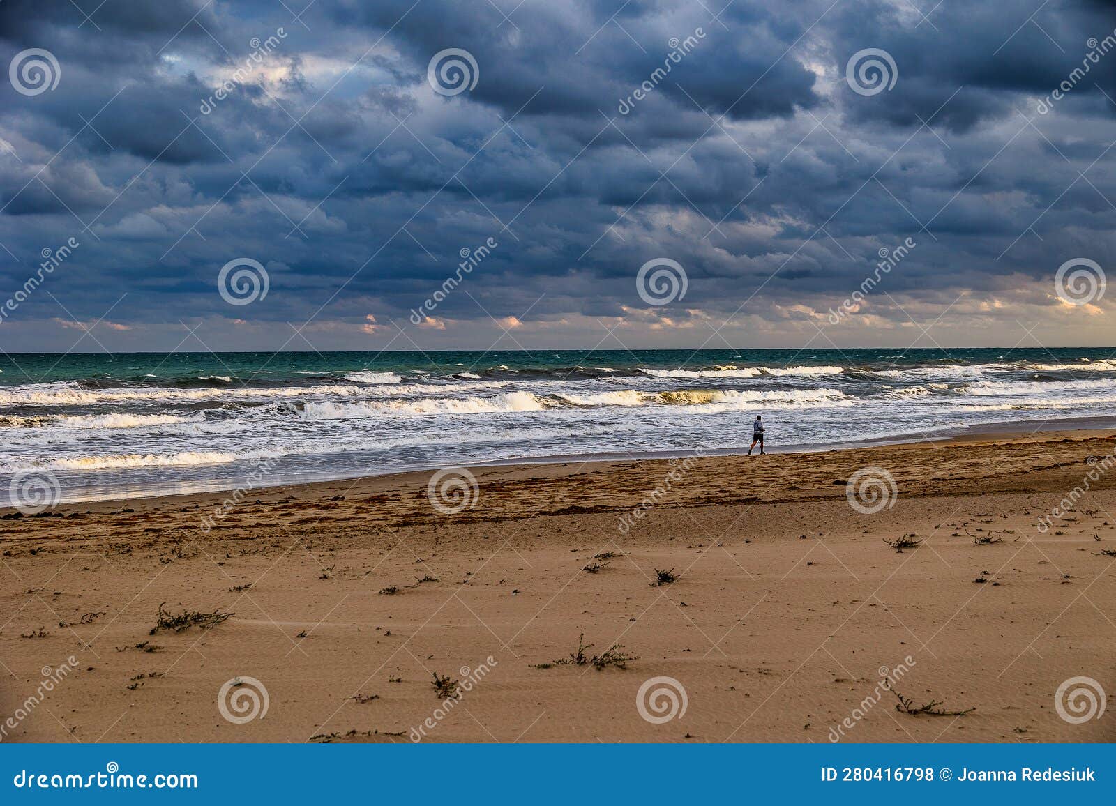 Beach by the Sea and a Lonely Runner on the Shore Landscape Stock Photo ...