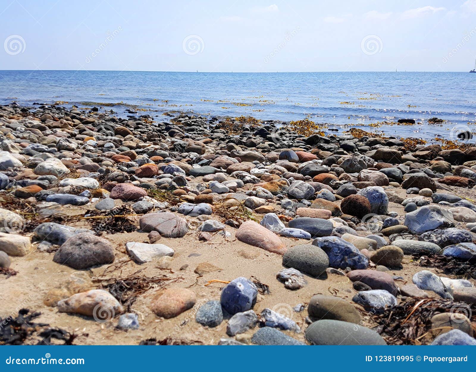 Beach by the Sea with Many Rocks Stock Image - Image of sand, stones ...