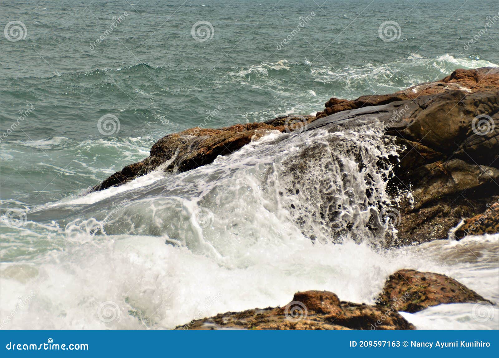 The Wave Hitting the Rocks on the Beach Stock Image - Image of rocks ...