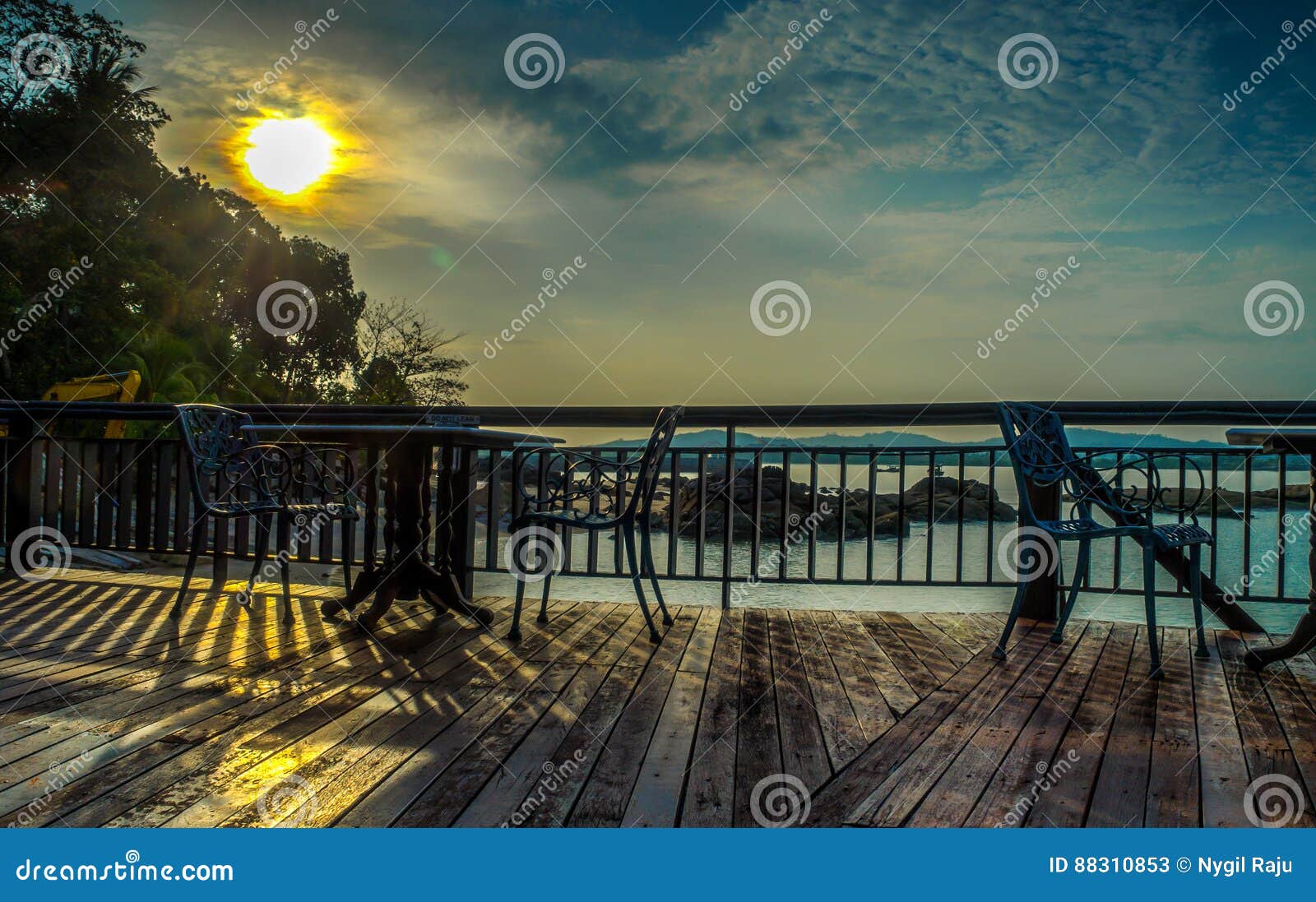Beach Side Cafe with Sunrise in Backdrop Stock Image - Image of clouds ...