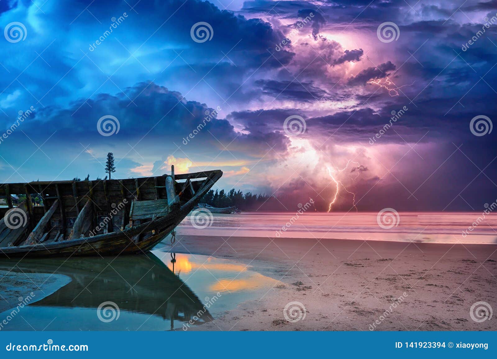 Beach and stormy sky stock photo. Image of beach, clouds - 141923394