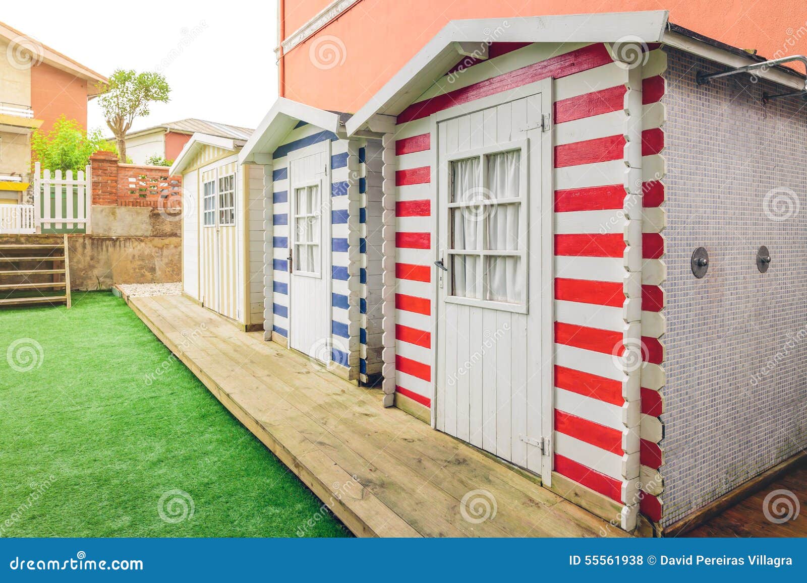 Beach Striped Huts in a Home Garden Stock Photo - Image of bathe, ocean ...