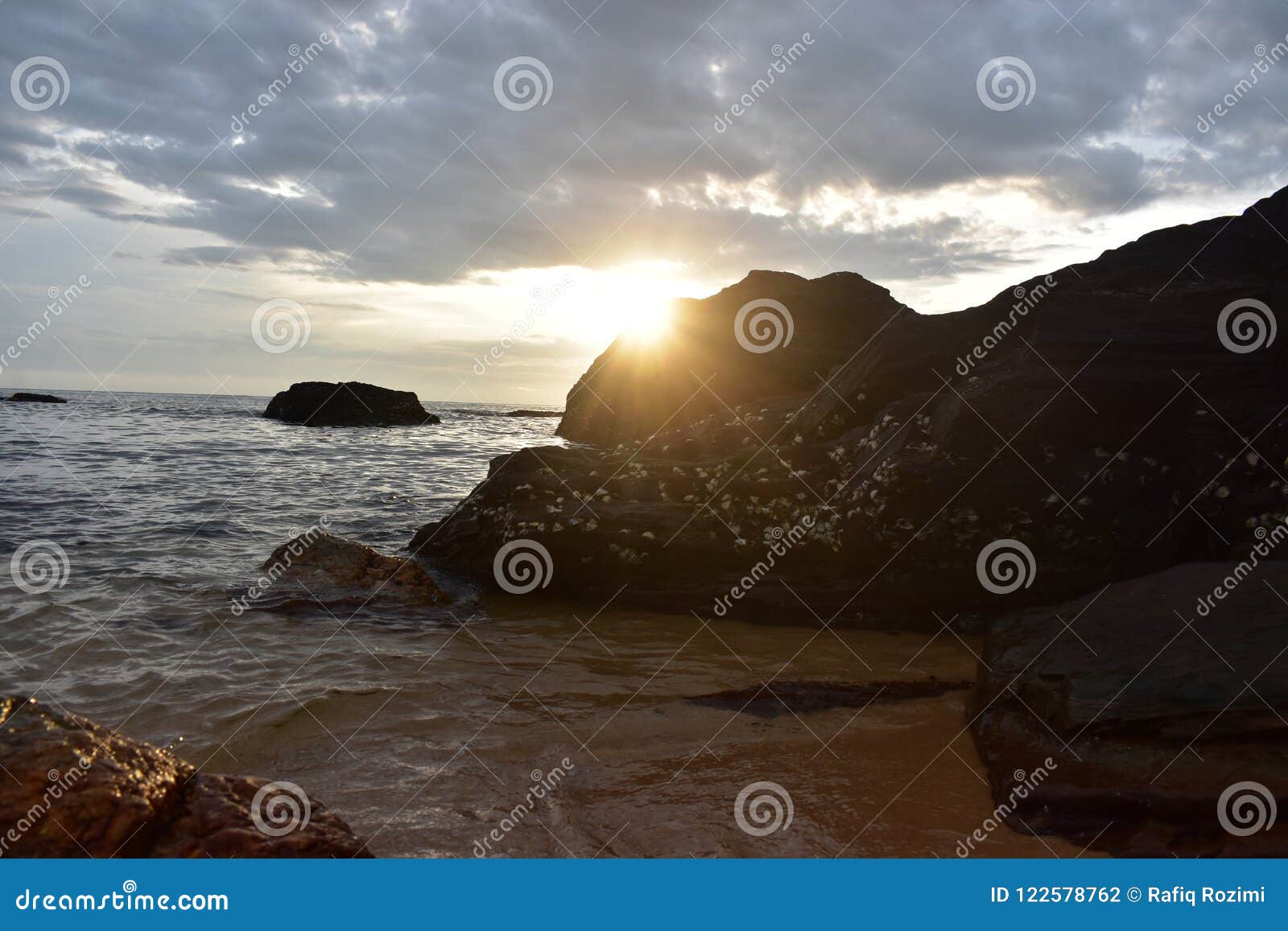 Beach Sunrise and Rocks stock photo. Image of dawn, south - 122578762