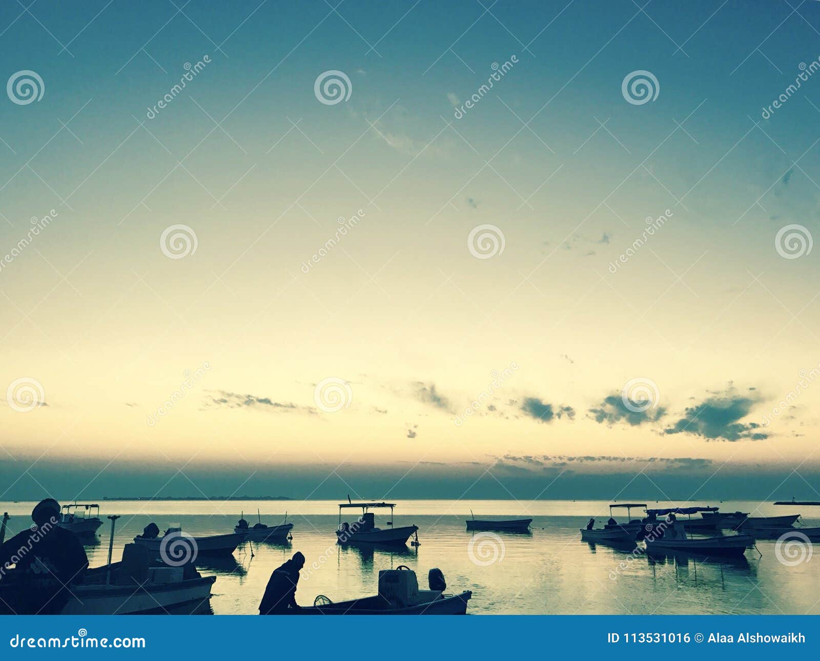 Beach editorial photo. Image of beach, boat, sunset - 113531016