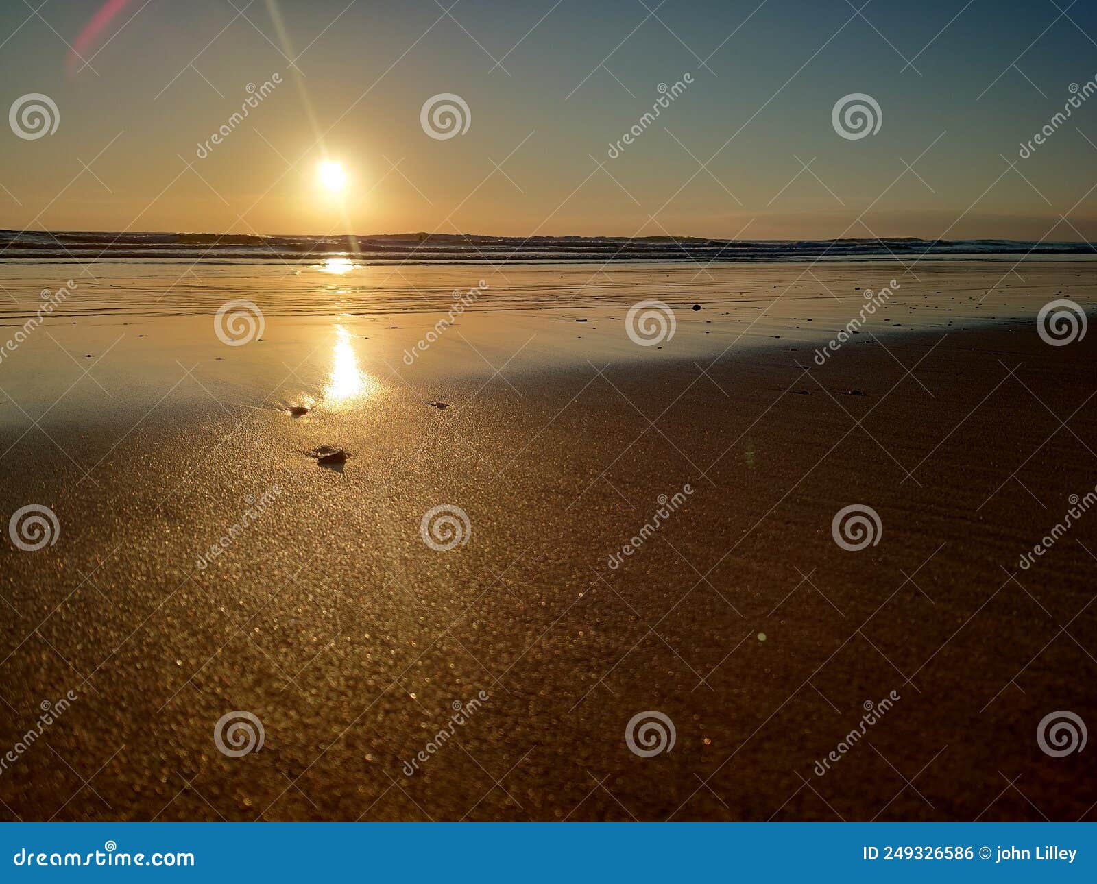 Beach sunset Cornwall stock photo. Image of sunlight - 249326586