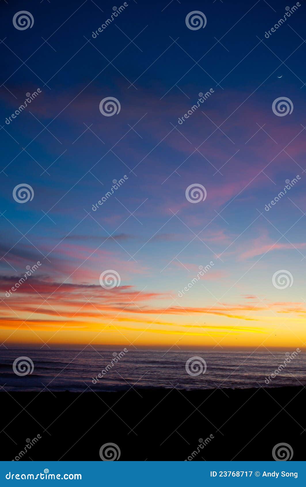 Beach at sunset with moon stock image. Image of cloudy - 23768717