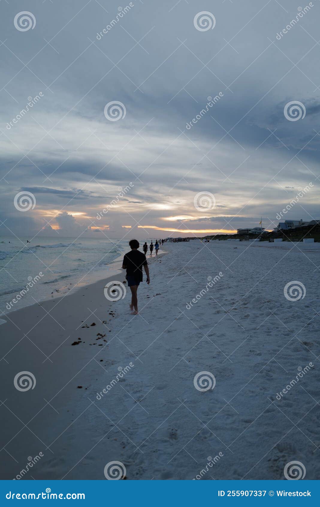 Beach during Sunset with People Resting on the Beach Stock Image ...