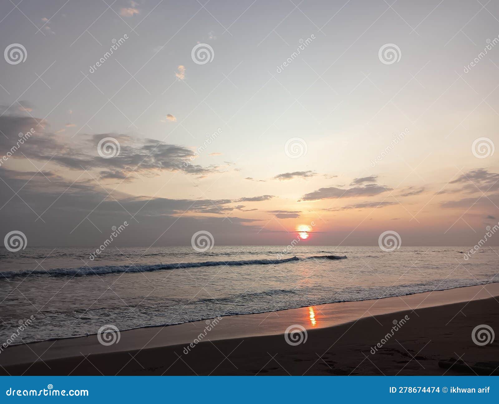 A Beach Sunset with a Petite Sun Stock Photo - Image of enchanting ...
