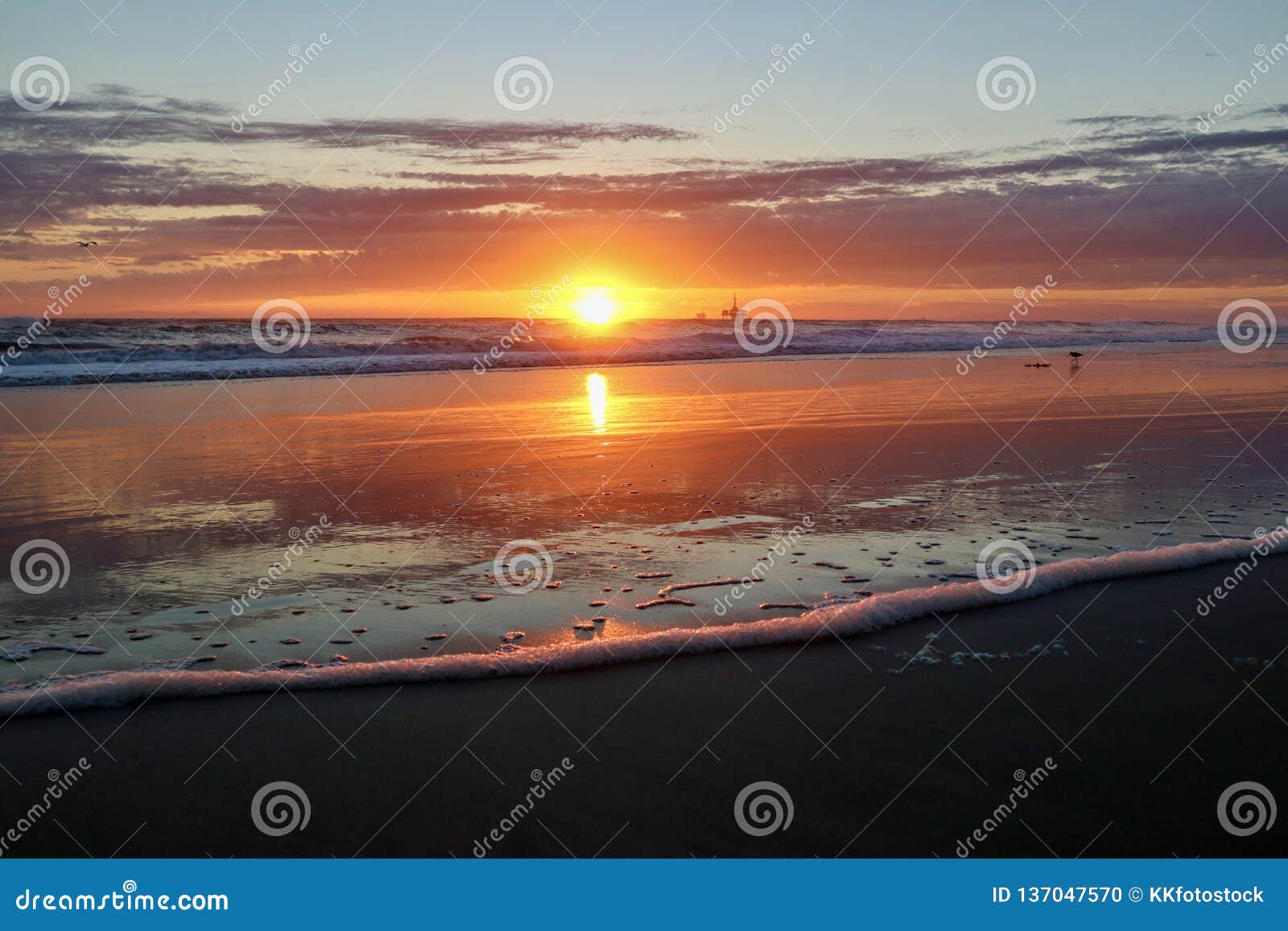 Beach Sunset with Reflections on Sand Stock Photo - Image of orange ...