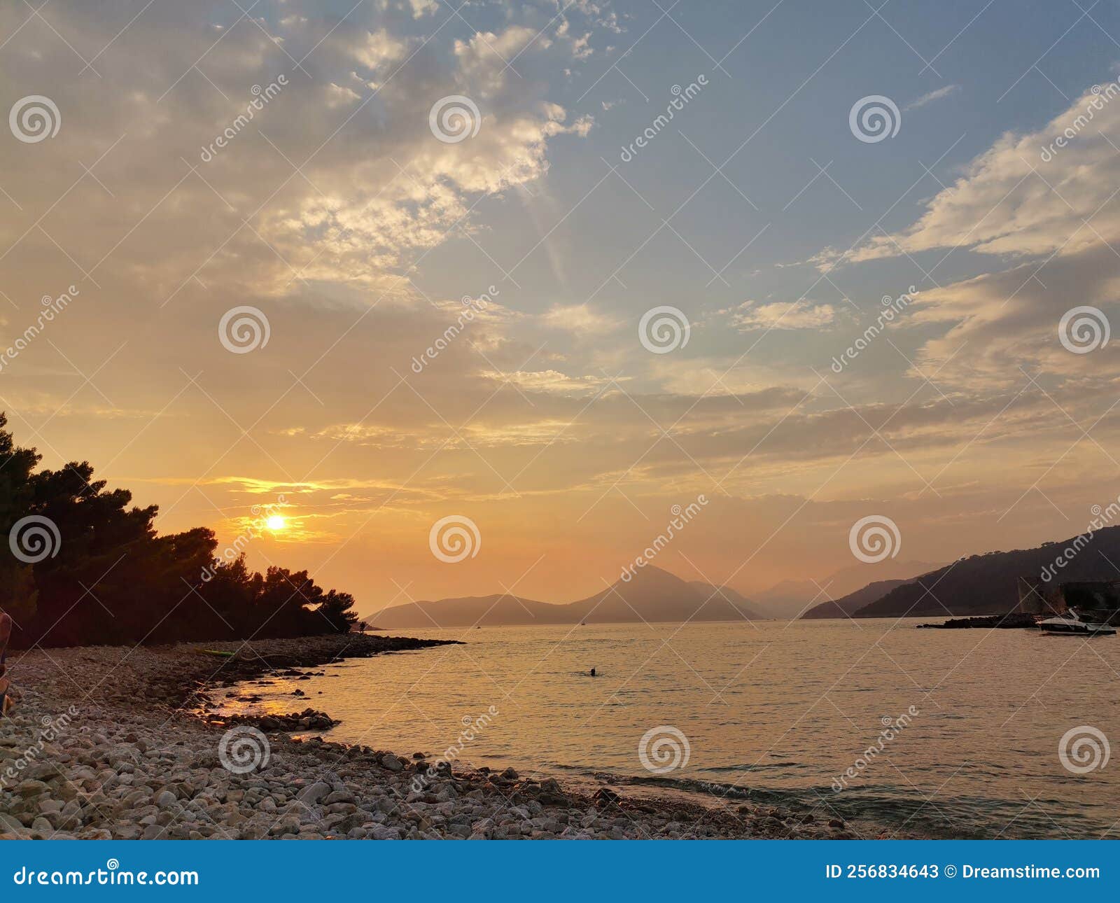 Beach sunset view stock image. Image of sunlight, afterglow - 256834643