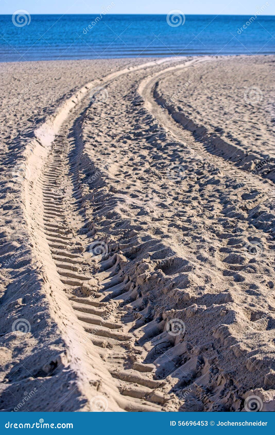 Beach with tracks stock image. Image of sunshine, ocean - 56696453