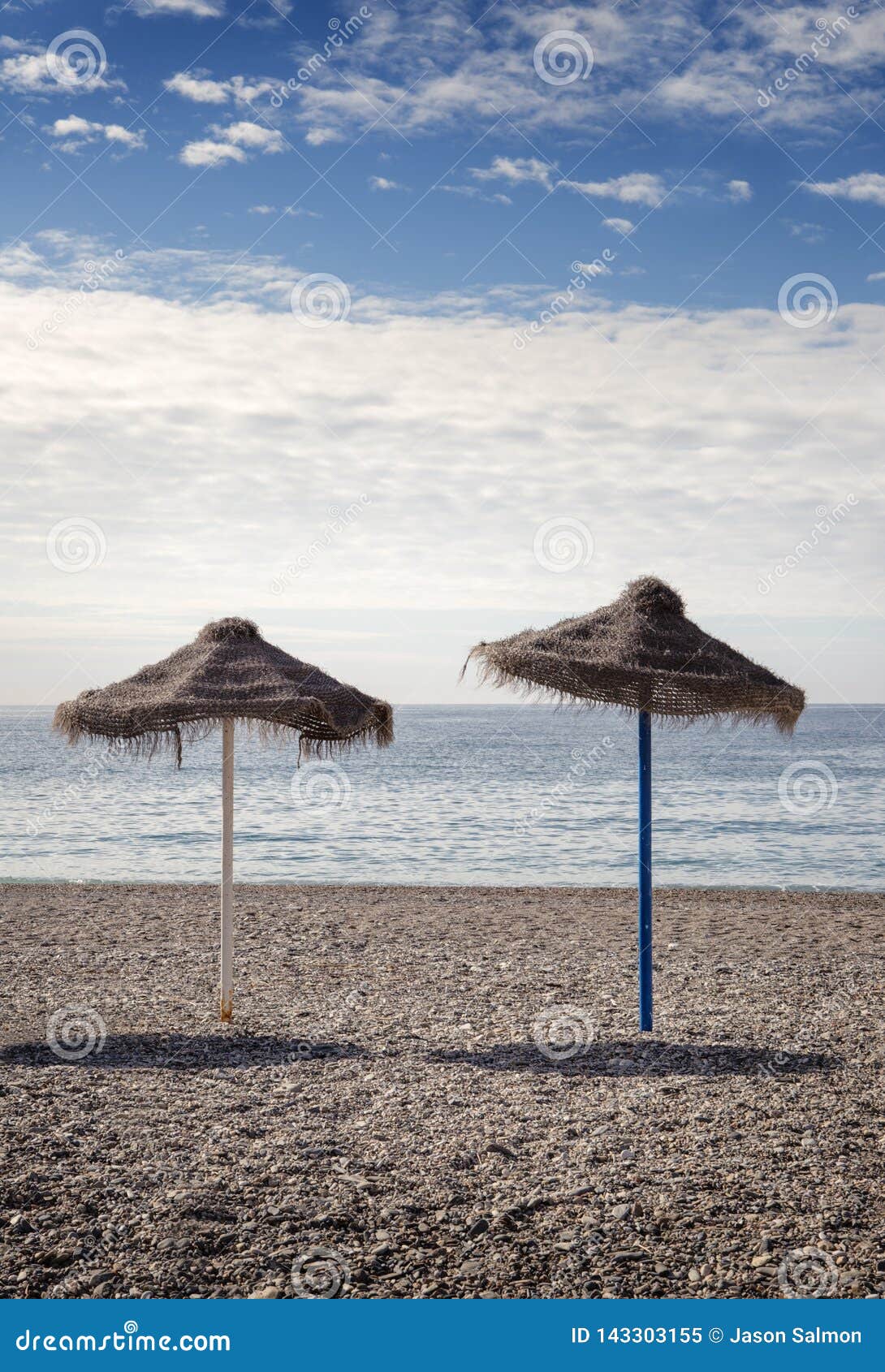 Beach umbrella in spain stock image. Image of palm, travel - 143303155