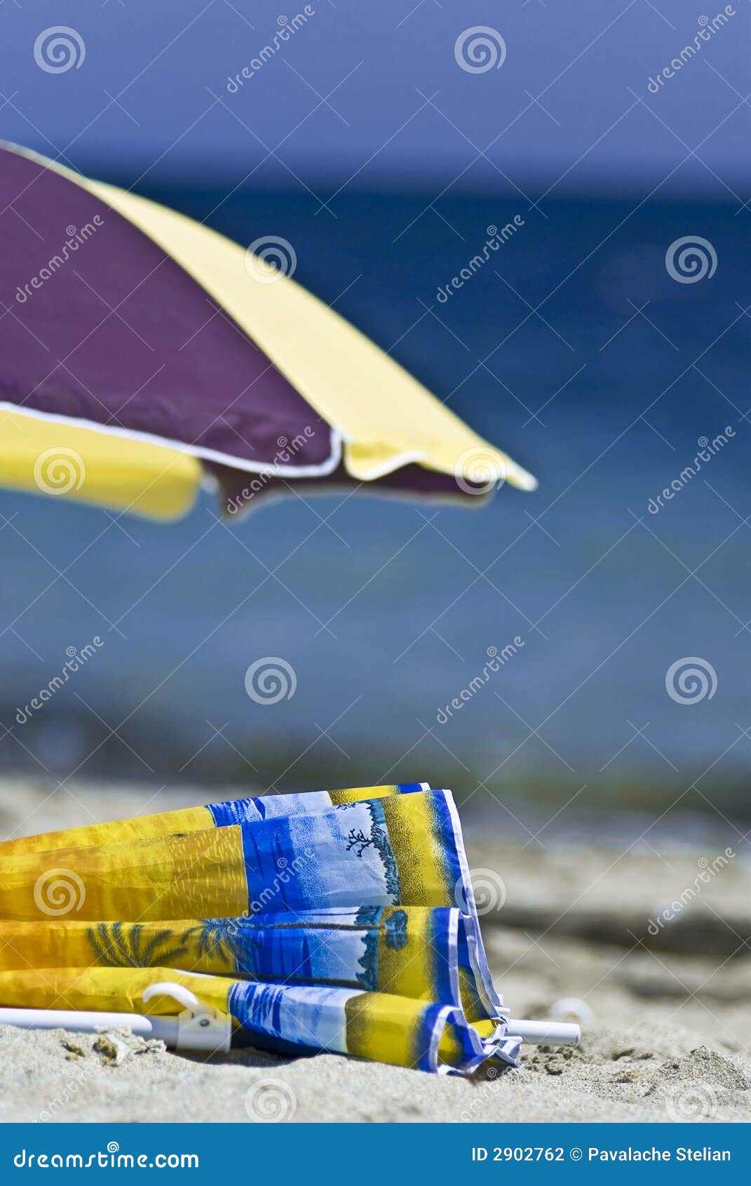 Beach umbrellas stock photo. Image of sunlight, seaside - 2902762