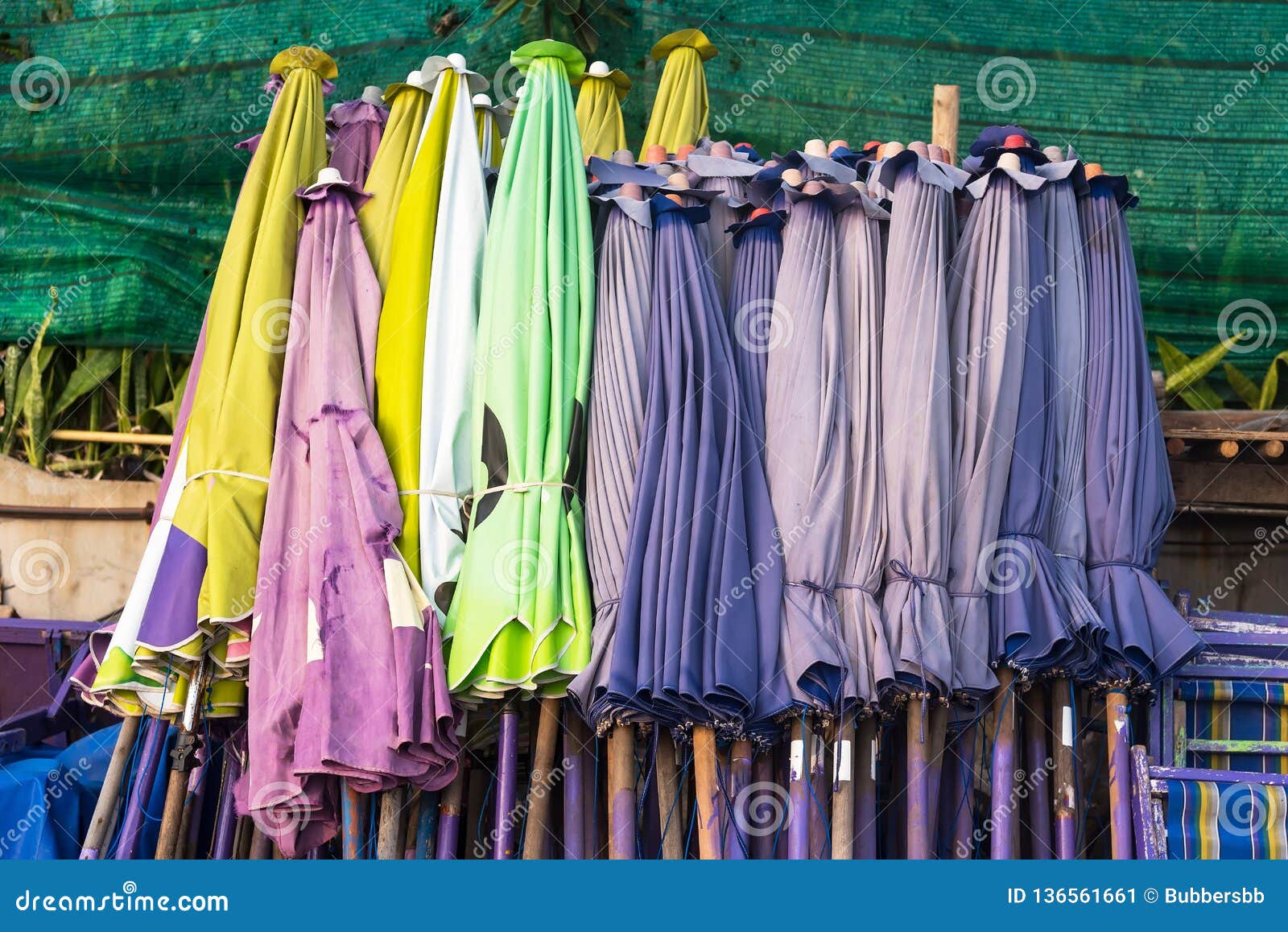 .Beach Umbrellas Closed Placed Together Against the Wall.Thailand Stock ...