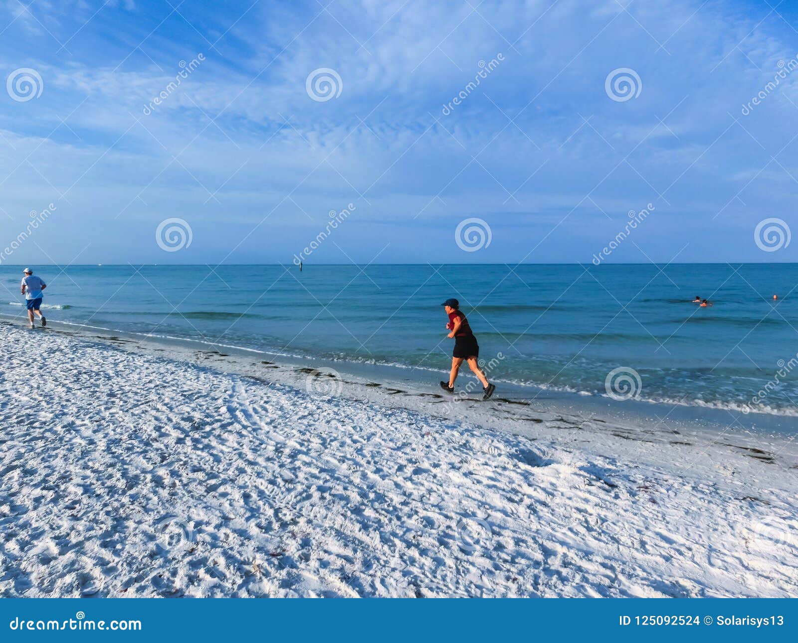 Beach Walking on Siesta Key Beach Editorial Stock Image - Image of ...