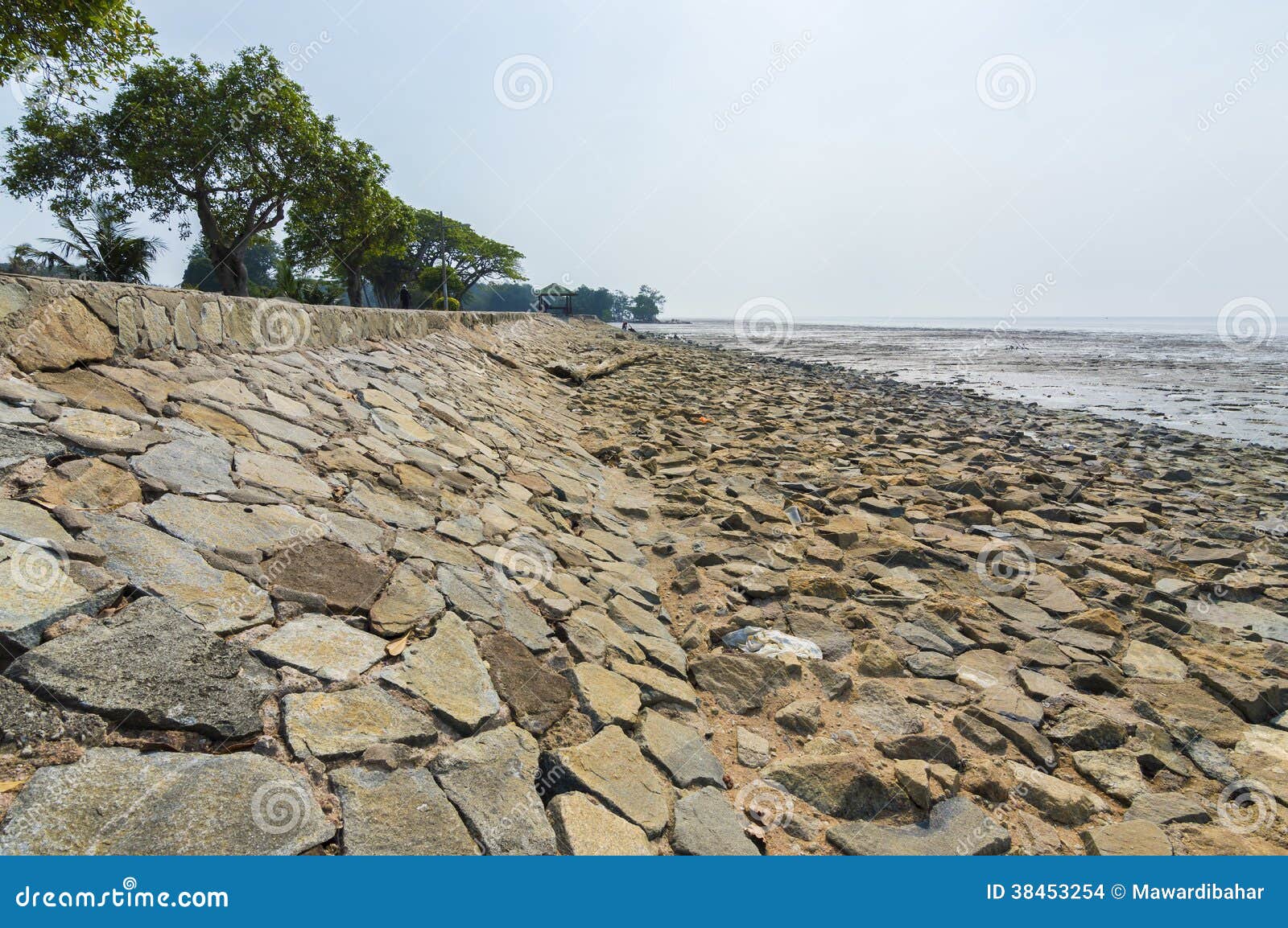 Beach wall stone stock photo. Image of ocean, sand, construction - 38453254