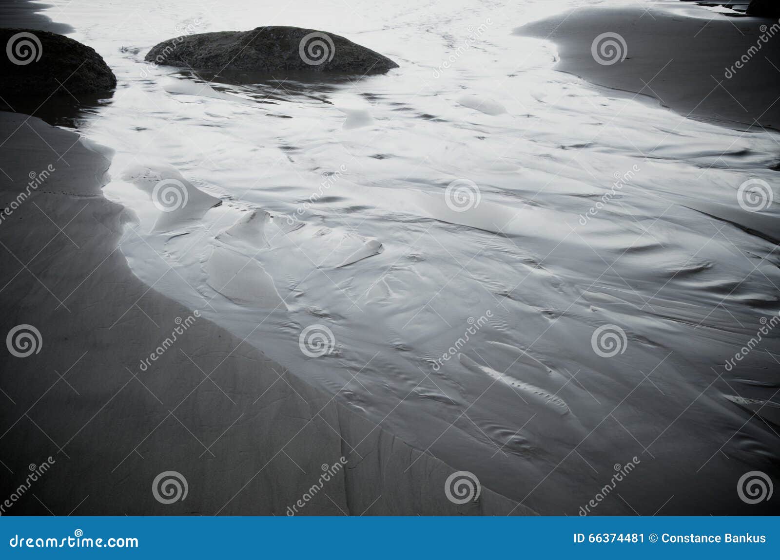 Beach Water Flow stock image. Image of reflective, sand - 66374481