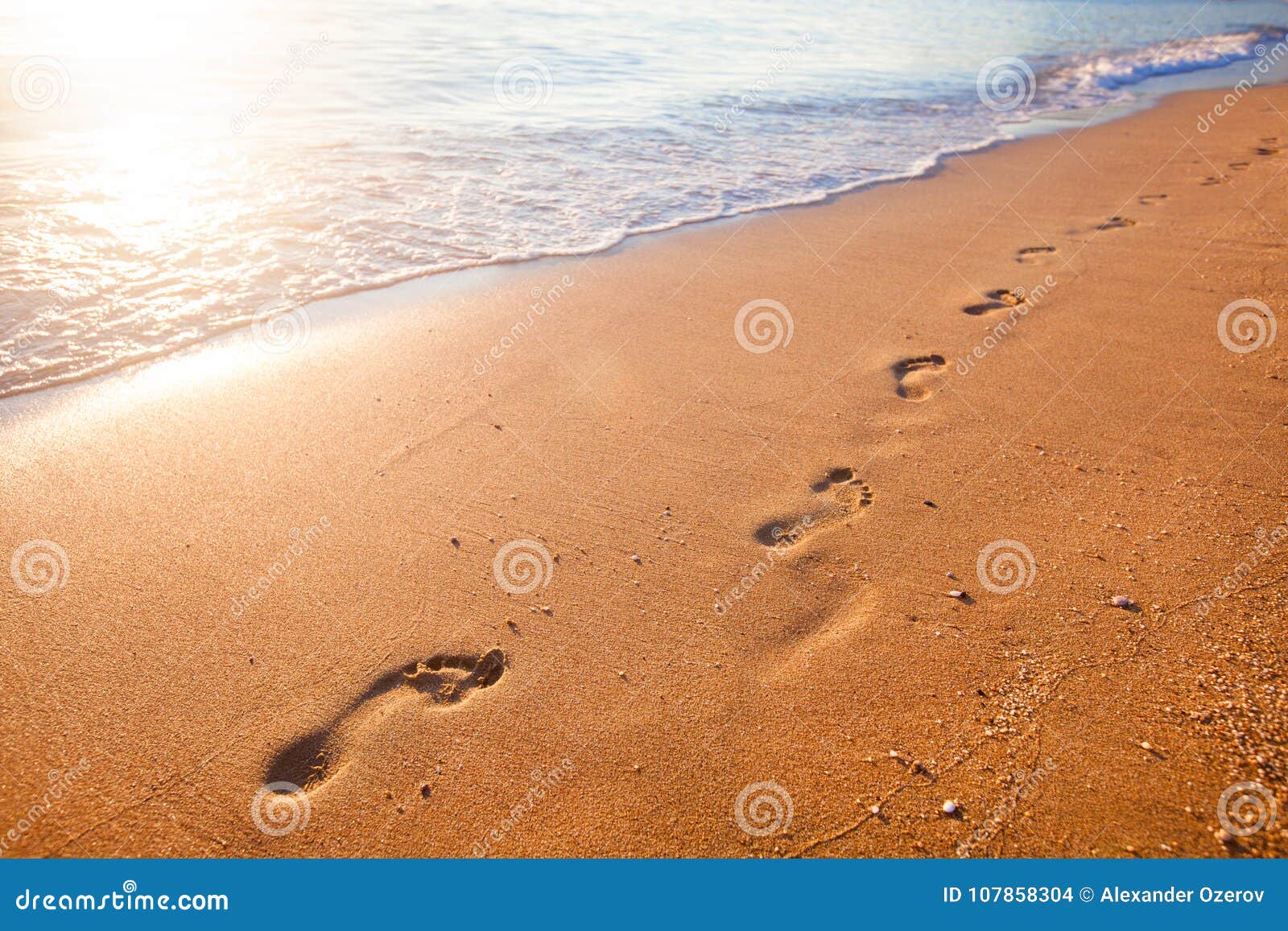 Beach, Wave and Footprints at Sunset Time Stock Photo - Image of path ...