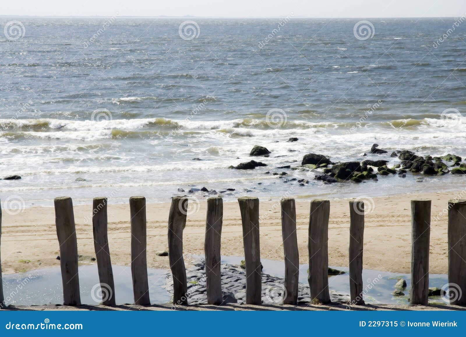 Beach with wooden poles stock image. Image of sportive - 2297315
