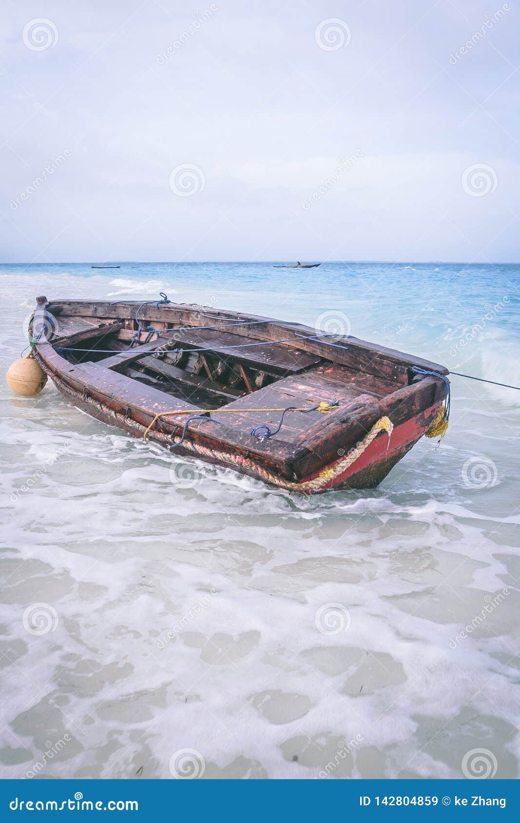 Beached Boat in Zanzibar in Foam Waves Stock Image - Image of seaside ...