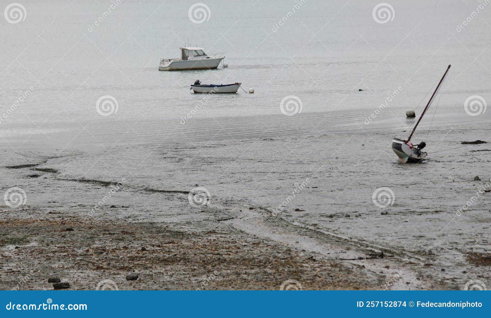 Beached Boats Stranded on Sand at Low Tide Stock Photo - Image of ...