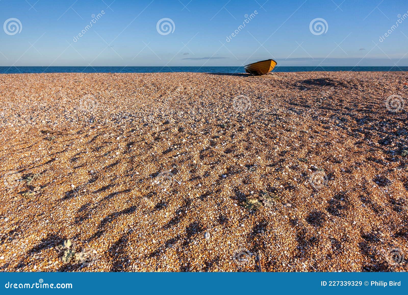 Beached Rowing Boat at Dungeness Stock Image - Image of blue, english ...