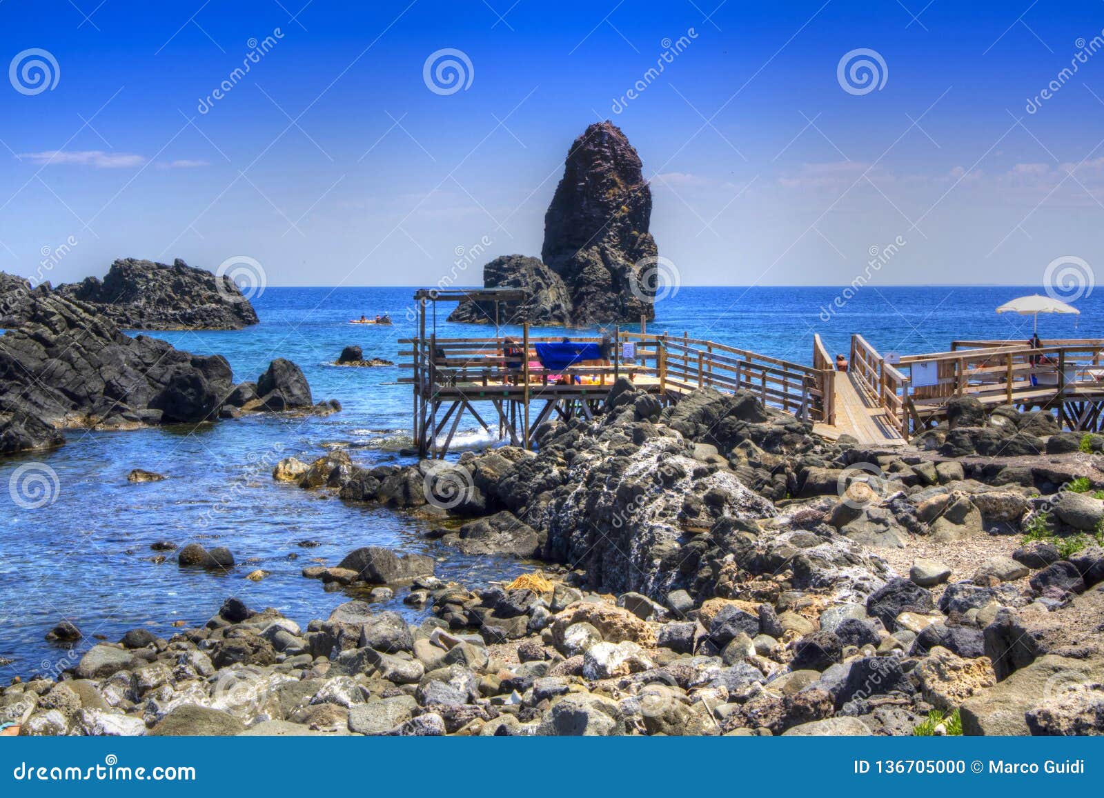 The beaches of Aci Trezza stock photo. Image of sicily - 136705000