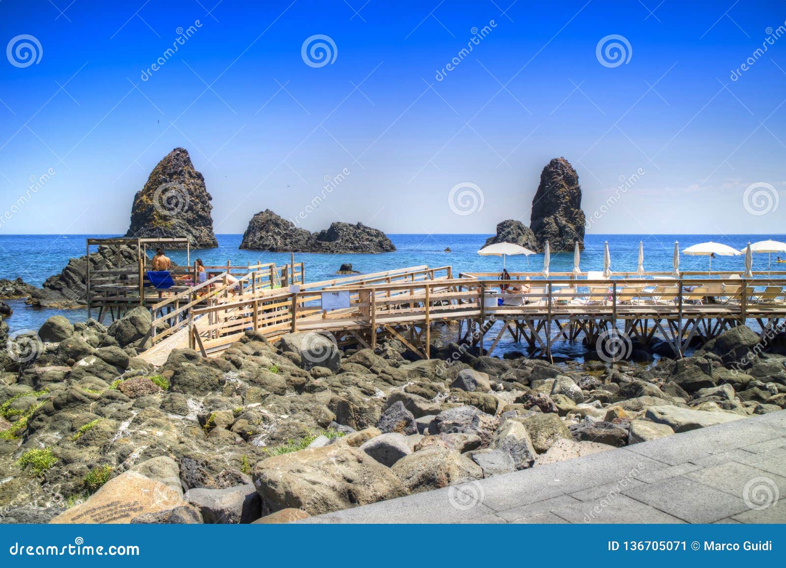 The beaches of Aci Trezza stock image. Image of summer - 136705071