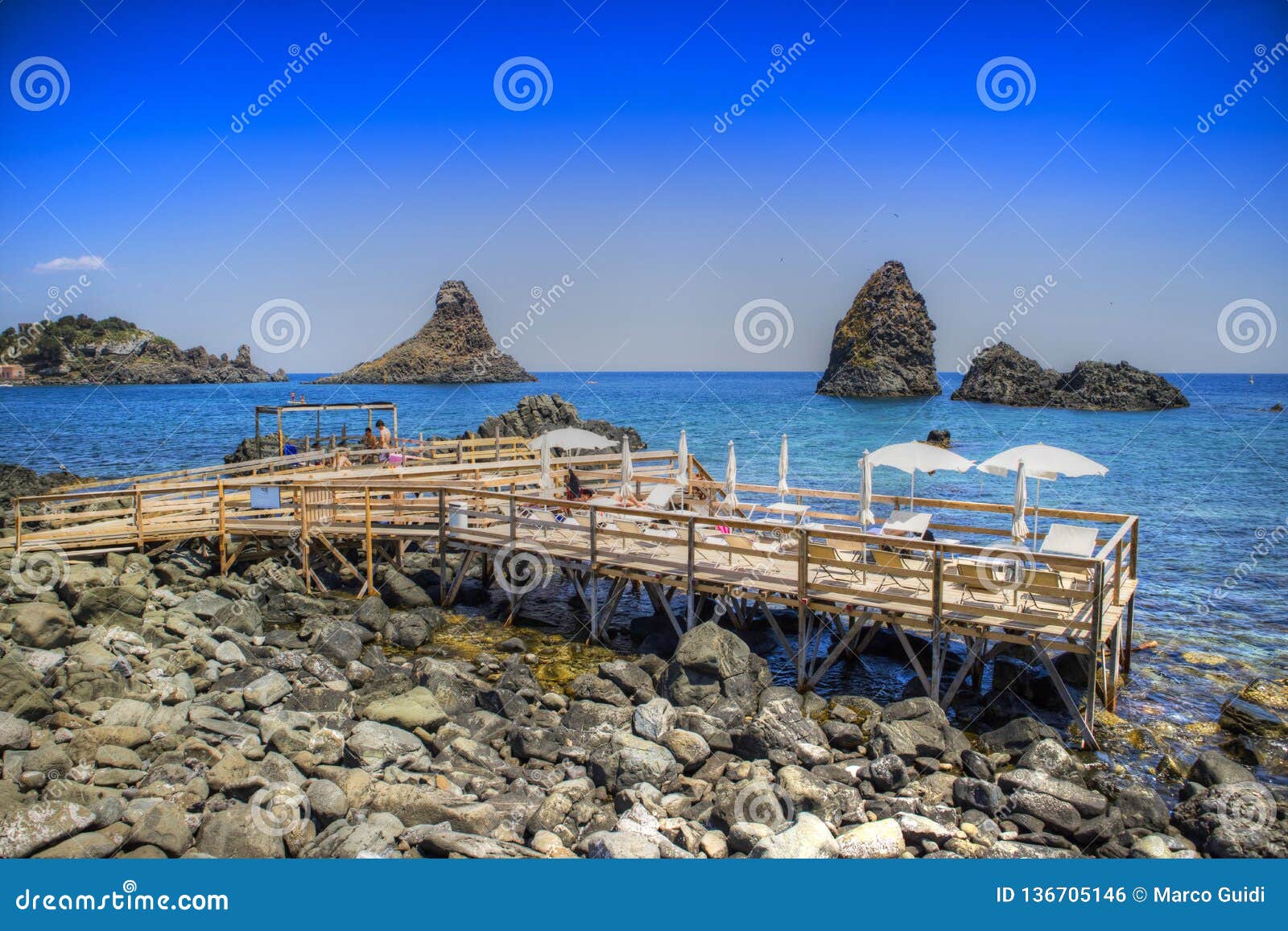 The beaches of Aci Trezza editorial photo. Image of relax - 136705146