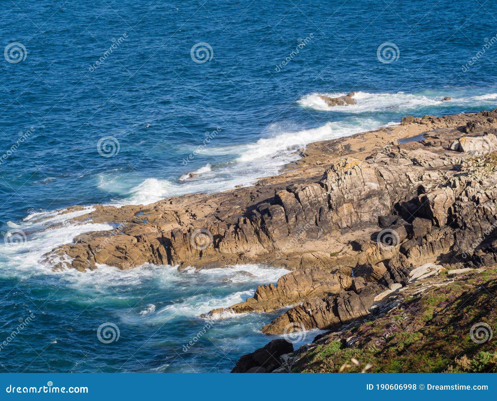 Beaches with Waves and Cliff at Sunset on the Spanish Coast Stock Photo ...