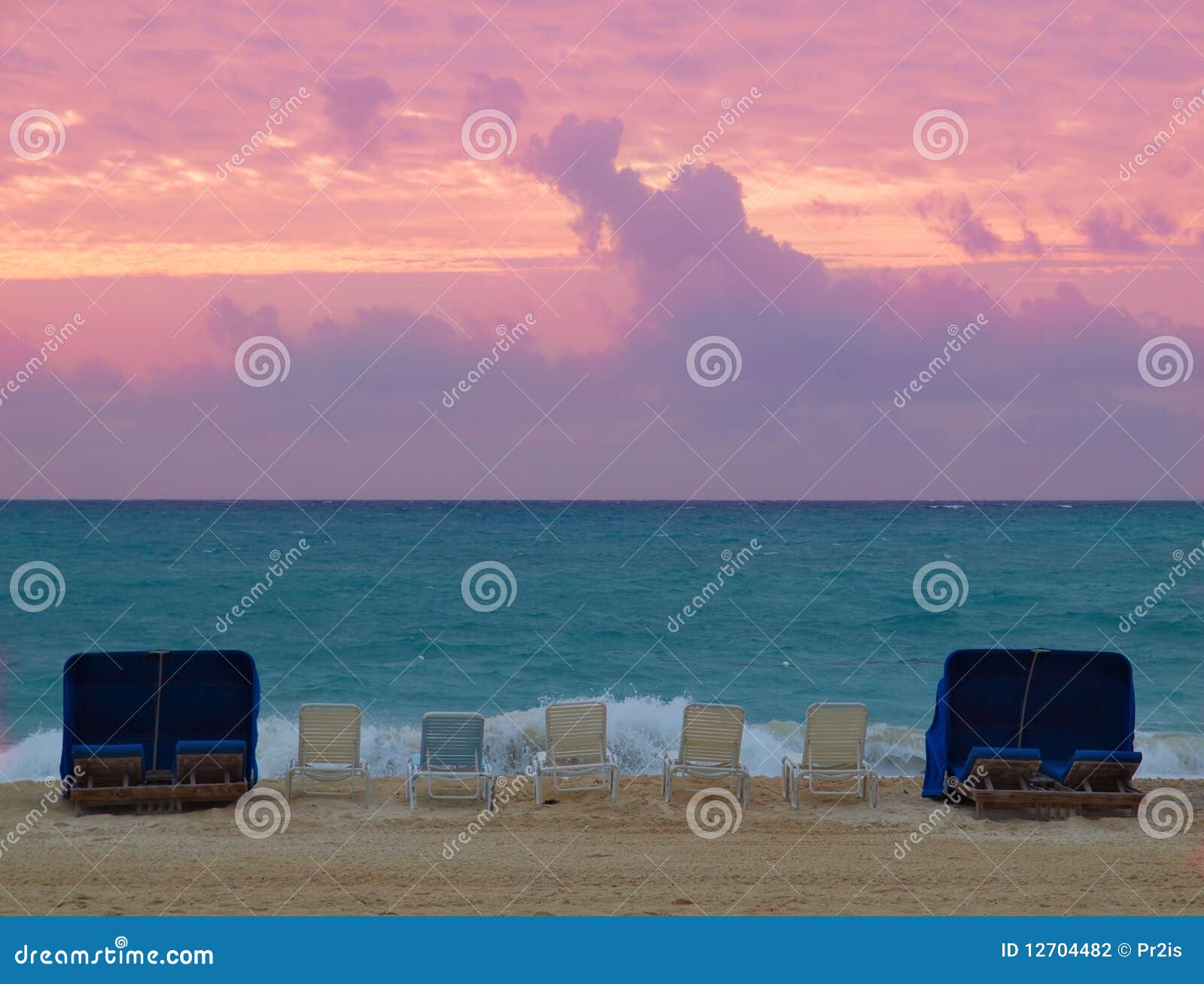 Beachfront at sunset stock photo. Image of vacations - 12704482