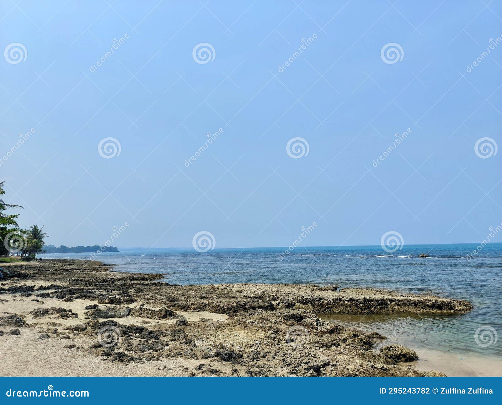 Beachfront with Views of the Blue Beach in Sunny Weather Stock Photo ...