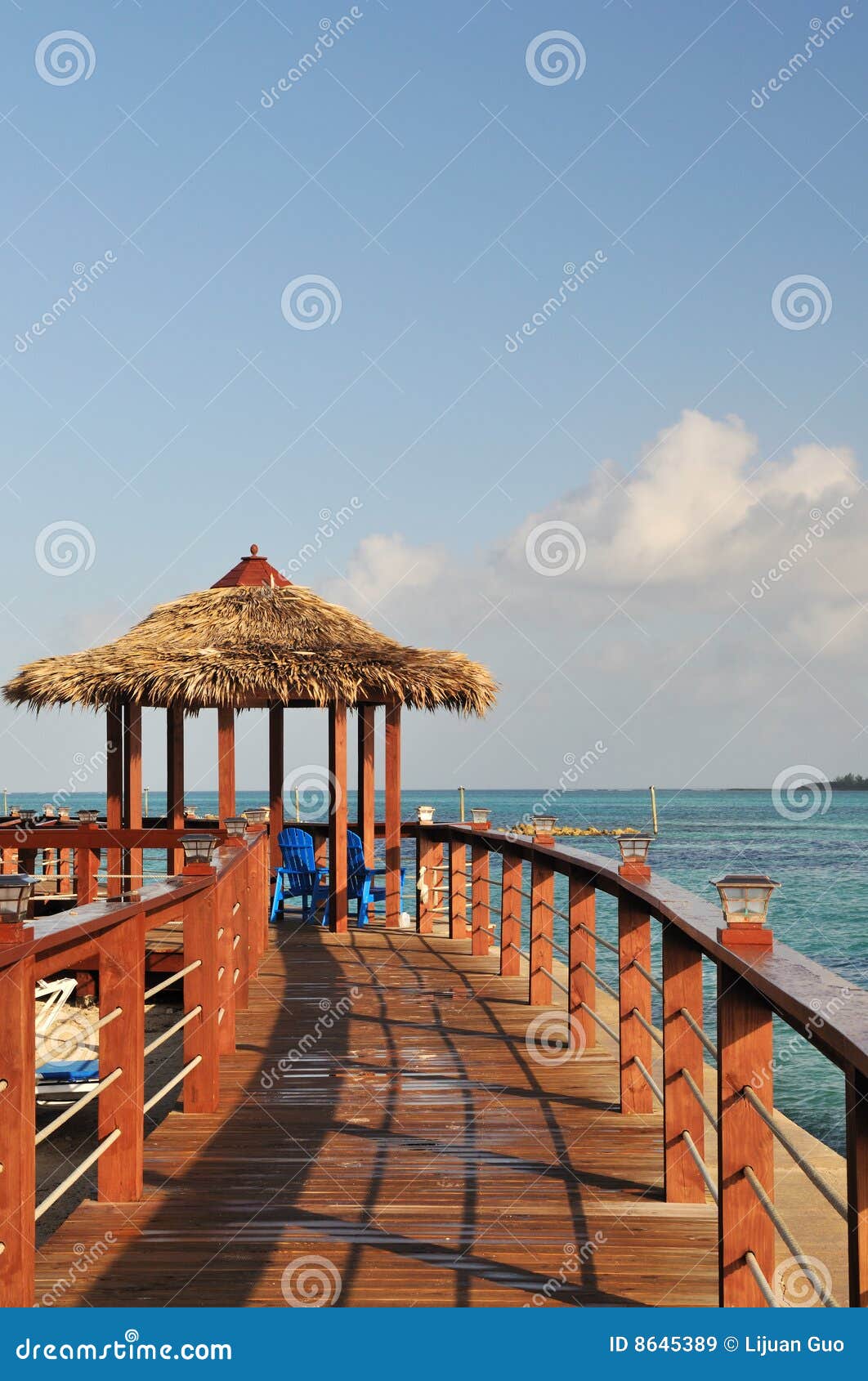 Beachside Pavilion and Walkway Stock Image - Image of caribbean, chair ...