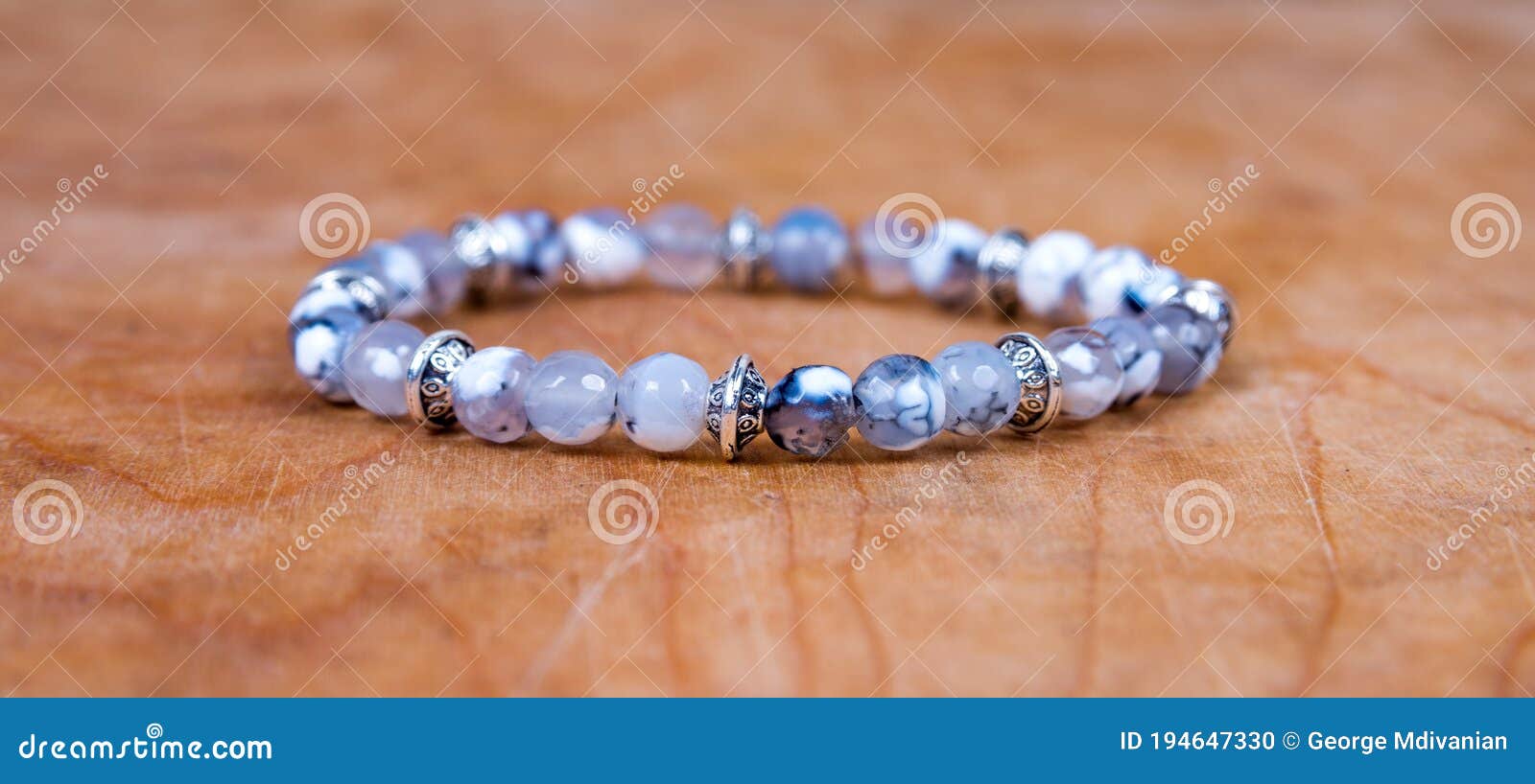 Bead bracelet on the table stock photo. Image of decoration - 194647330