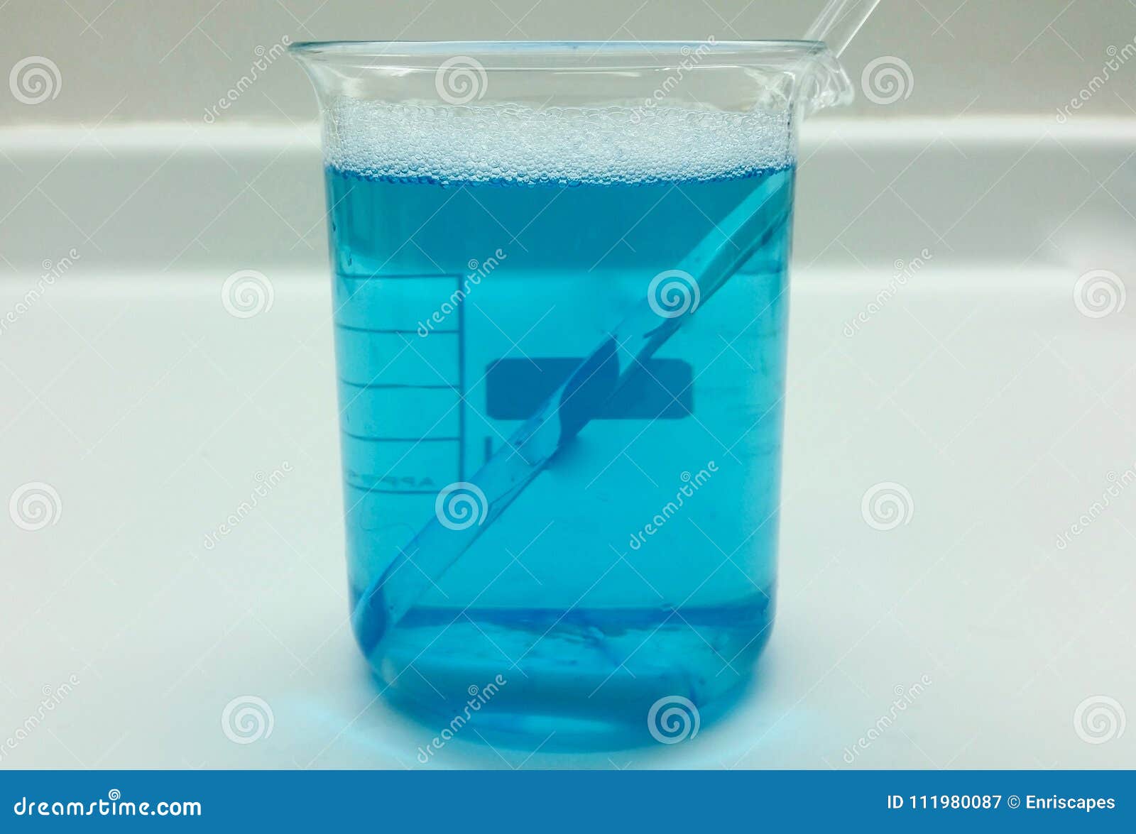 Beaker with blue bath gel stock image. Image of shampoo - 111980087