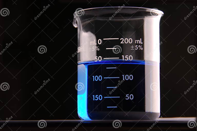 Beaker with blue liquid stock image. Image of laboratory - 3269555