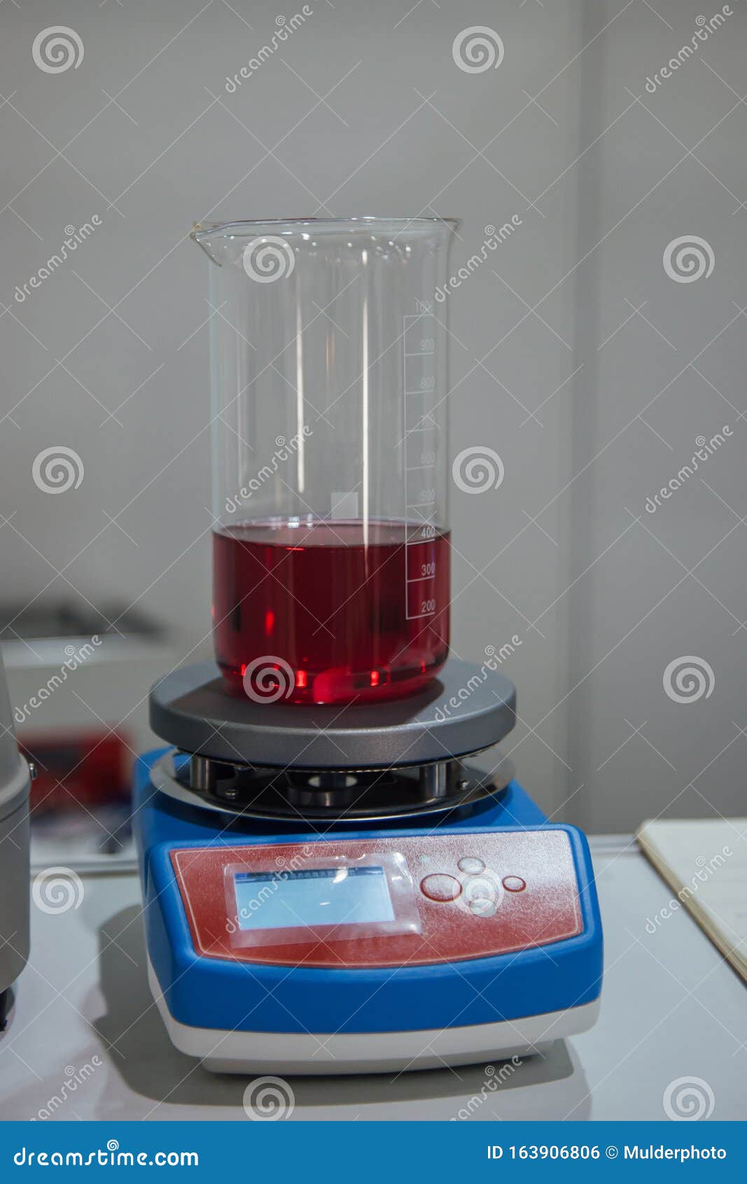 Beaker with Chemical Solution on Laboratory Scales Stock Photo - Image ...