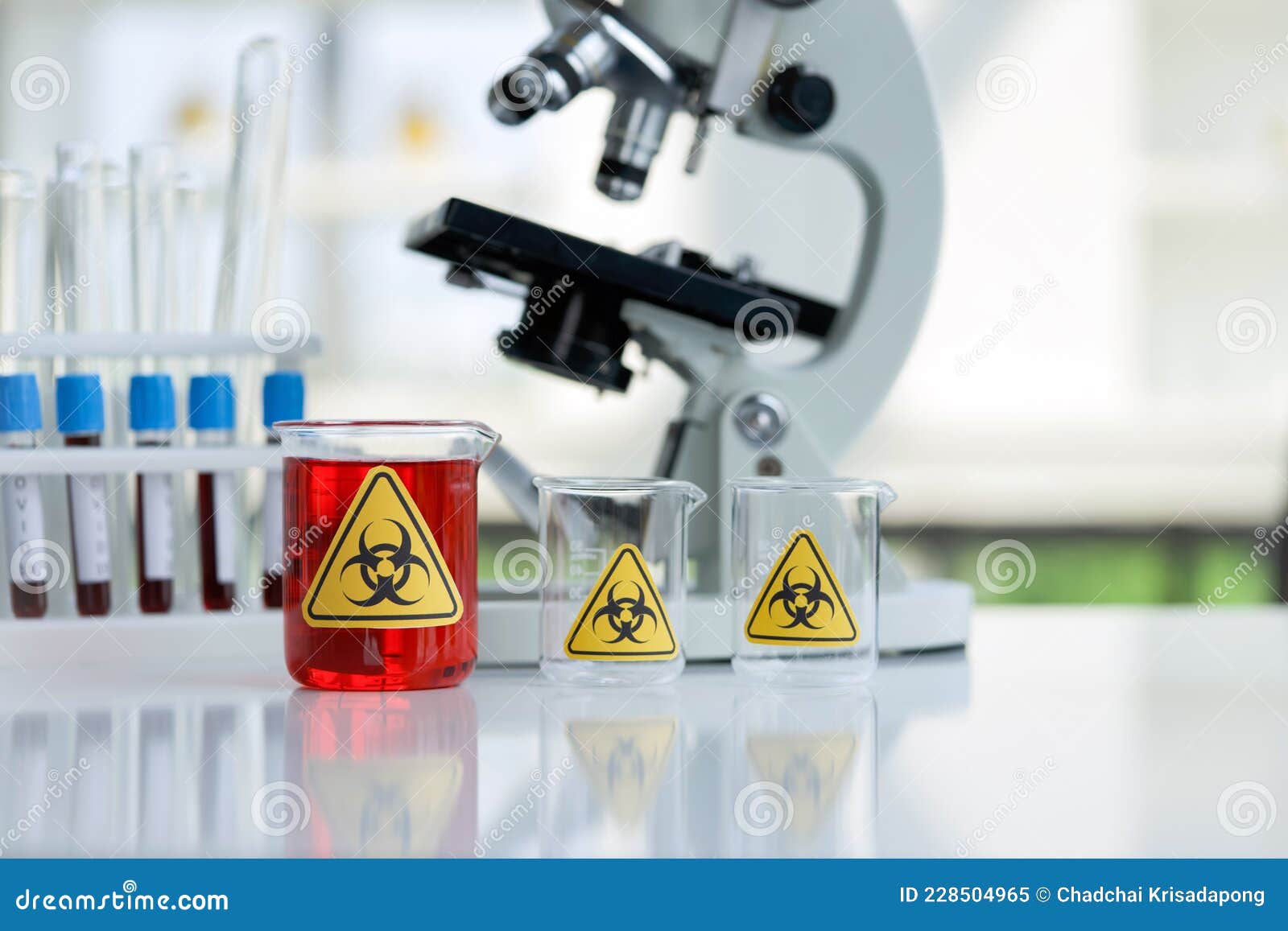 The Beaker Contains An Orange Solution. Beaker Is A Glass Science ...