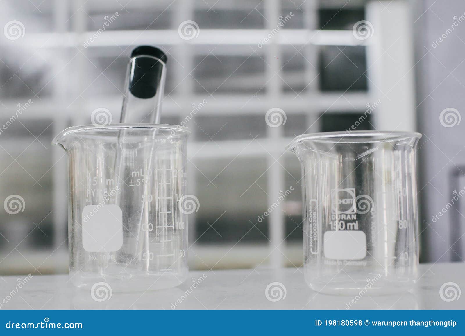 Beaker and Test Tubes in Chemistry Science Laboratory Background. Stock ...