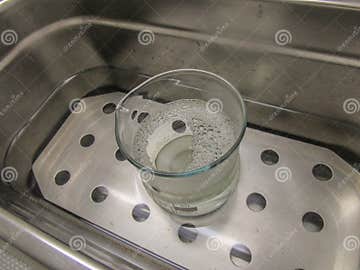 Beaker in a water bath stock photo. Image of glass, solution - 53480468