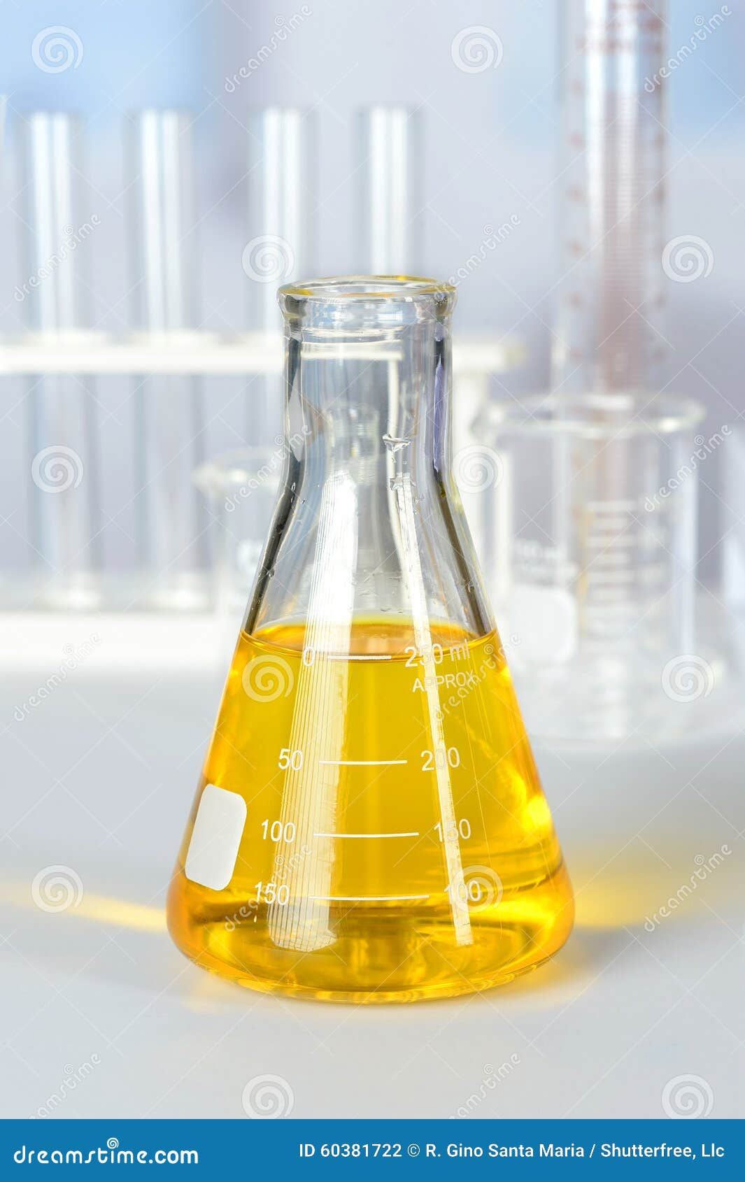 Beaker with Yellow Colorant Stock Photo - Image of experiment, liquid ...