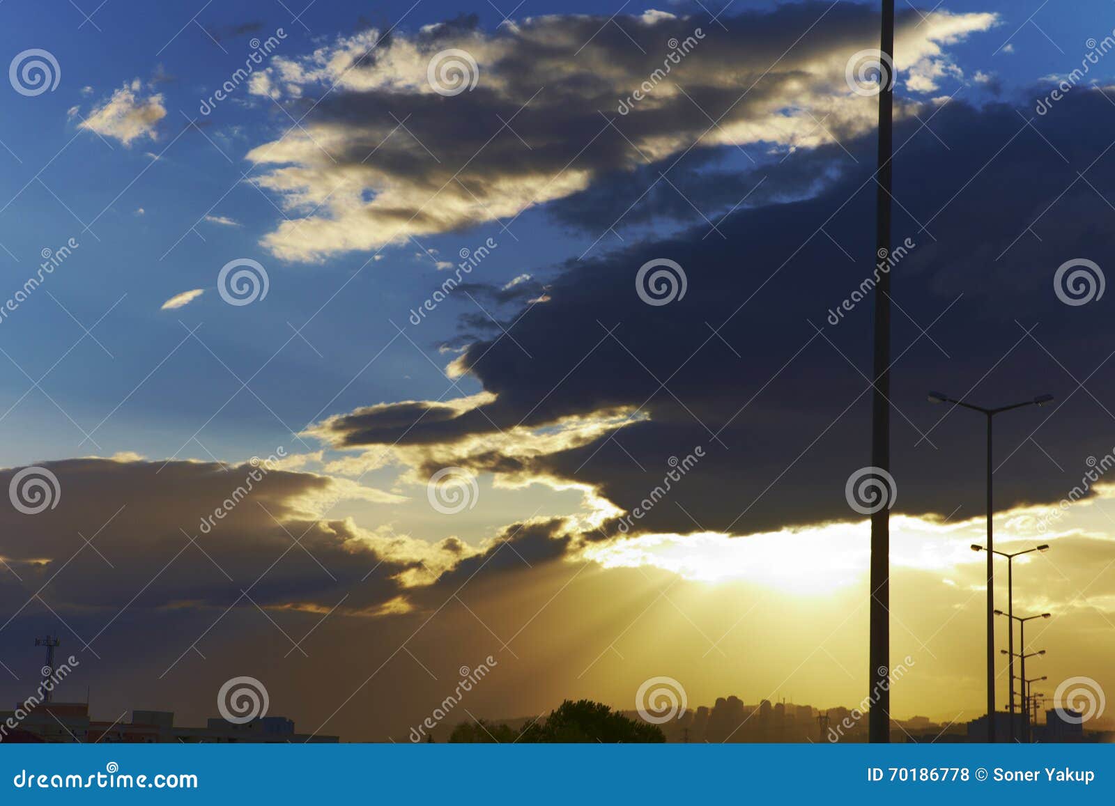 Beam of Sun and Lampposts stock photo. Image of rays - 70186778