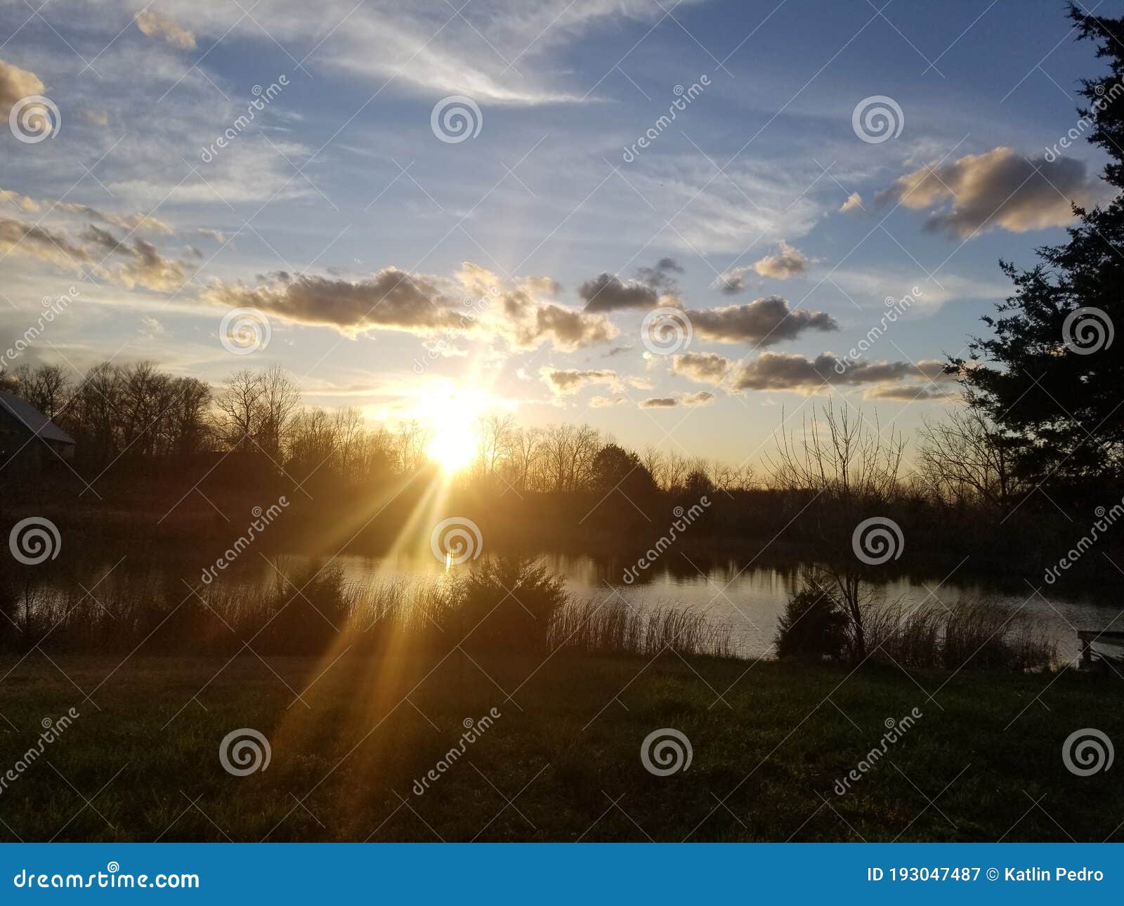 Beaming sun rays stock image. Image of sunrise, mist - 193047487