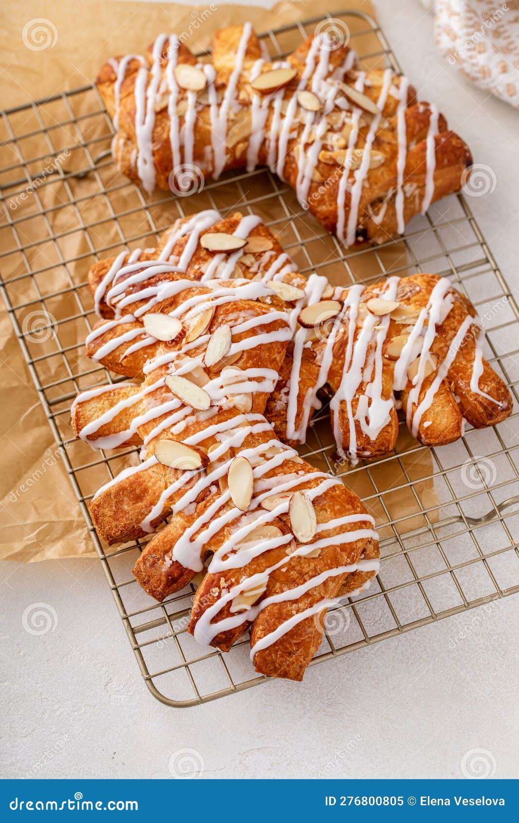 Bear Claw Pastry on a Cooling Rack with Glaze and Almonds Stock Image ...