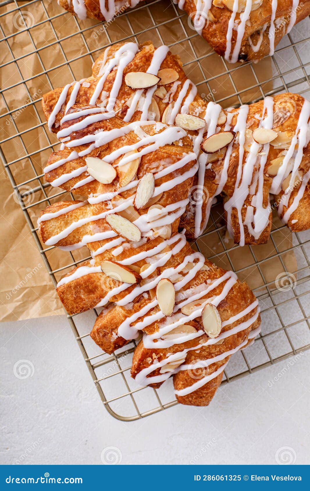 Bear Claw Pastry on a Cooling Rack with Glaze and Almonds Stock Image ...