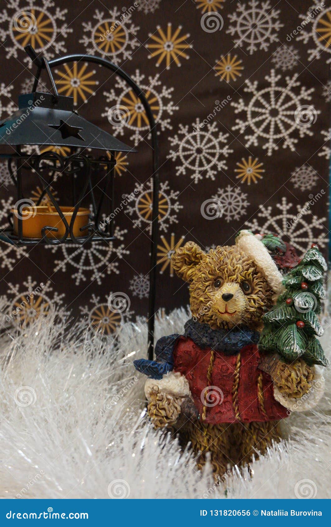 Bear Holds a Christmas Tree and Lantern Stock Photo - Image of ...