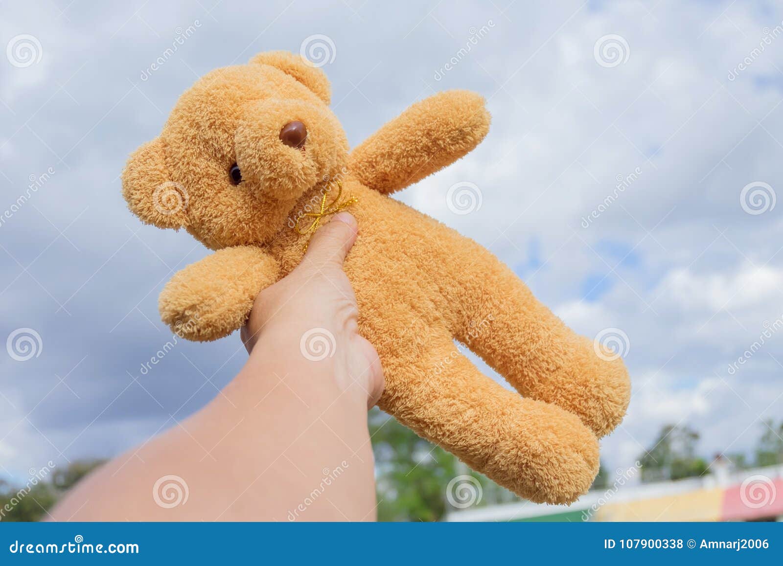 Bear toy in hand stock photo. Image of giving, white - 107900338